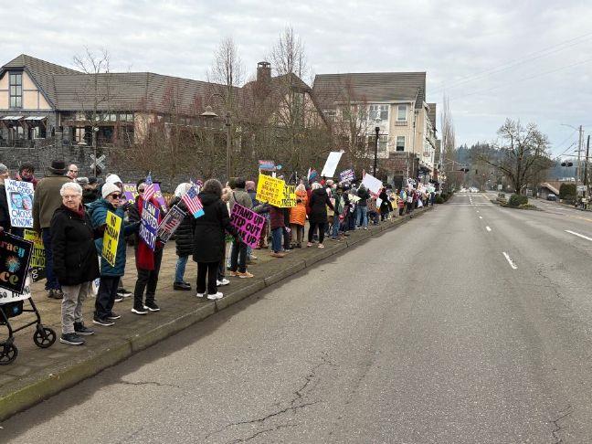Weekly Lake Oswego protests buoyed by woman offering signs | Lake ...