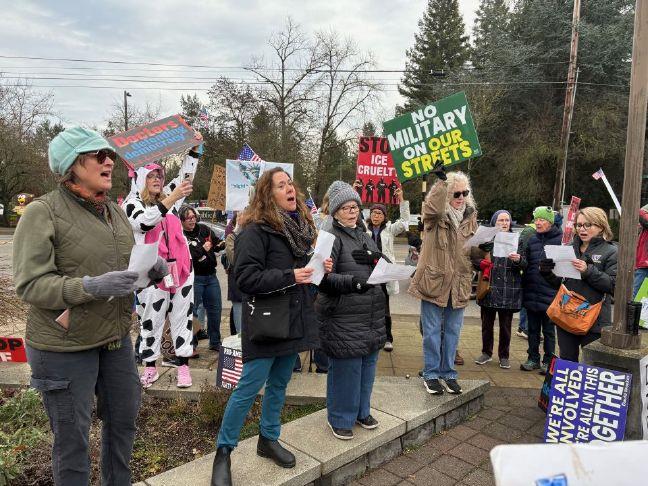 Weekly Lake Oswego protests buoyed by woman offering signs | Lake ...